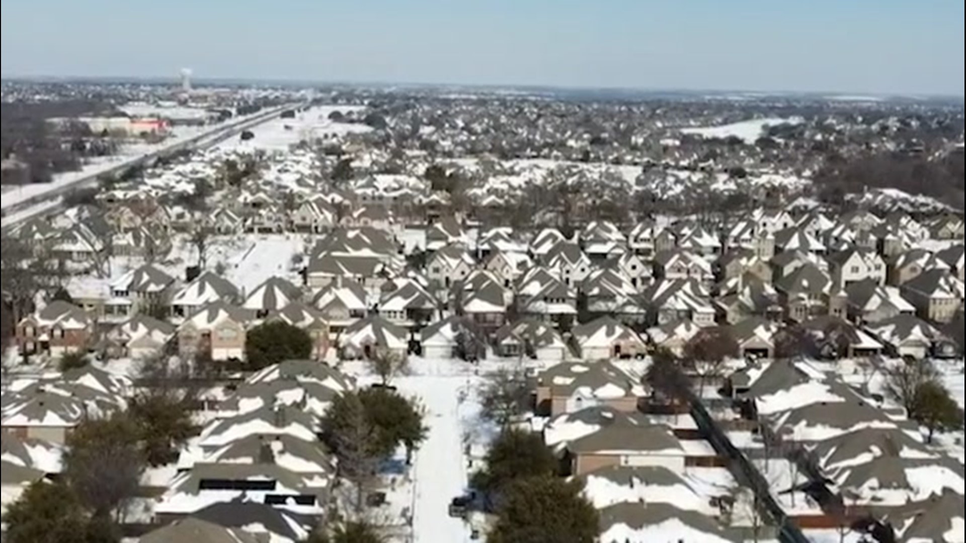 Soar over a snow-covered neighborhood in northern Texas | wthr.com