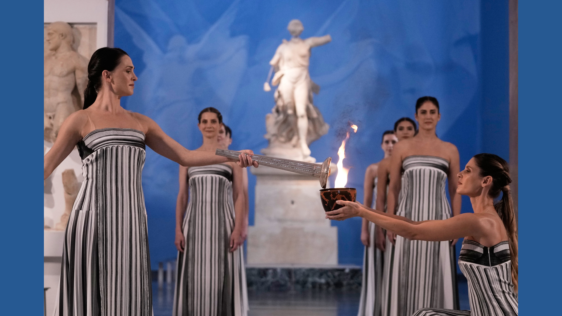 Under a cloud, the Olympic flame begins its journey to the Milan ...