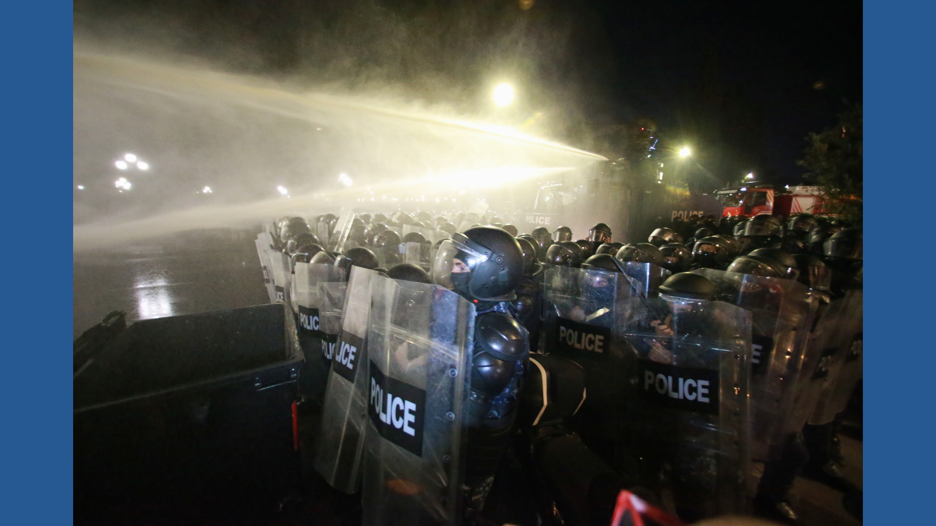 Georgia's police use water cannons to push back protesters trying to ...