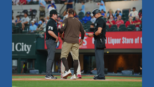 Only 2 umpires were on the field at the start of the Padres-Rangers ...