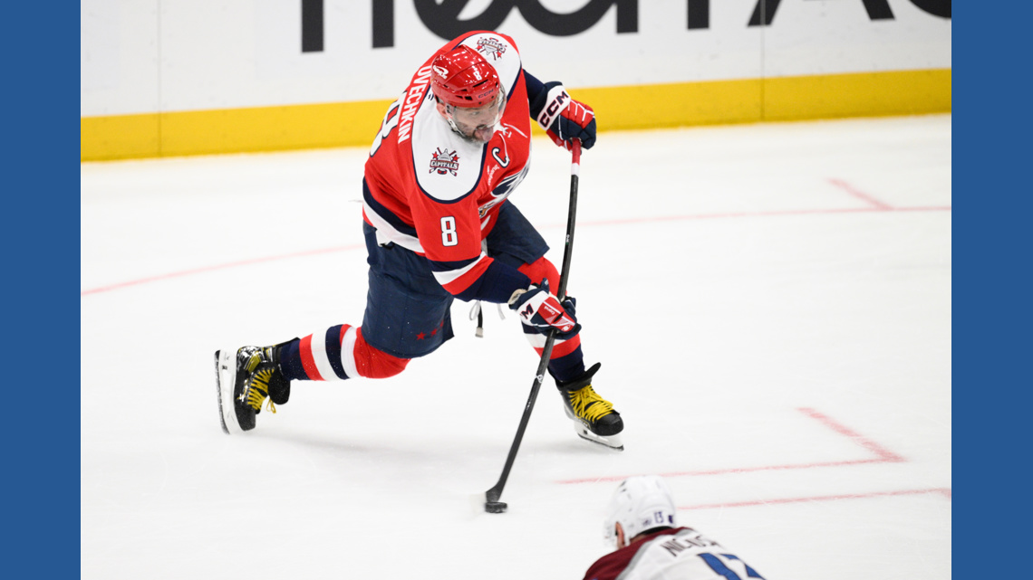 Caps' Alex Ovechkin records 1,000th career goal in 3-2 OT loss to ...