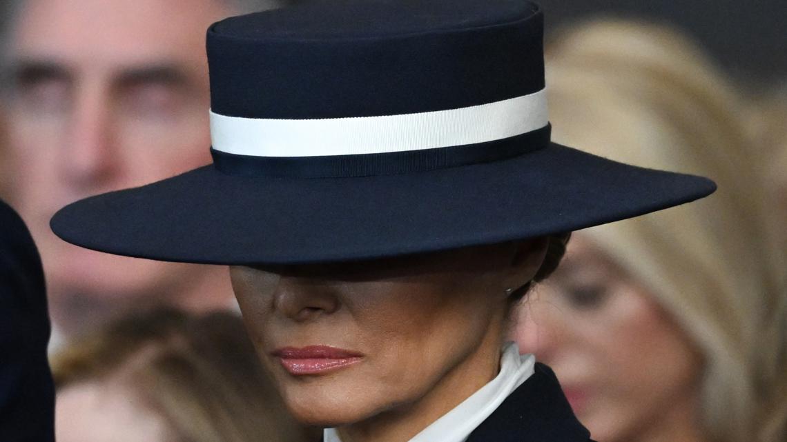 Melania Trump's wide-brimmed hat steals fashion spotlight on ...