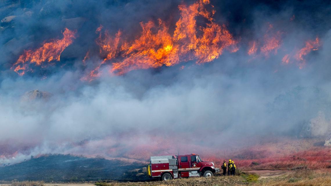Fast-growing wildfire in windy Southern California triggers evacuations ...