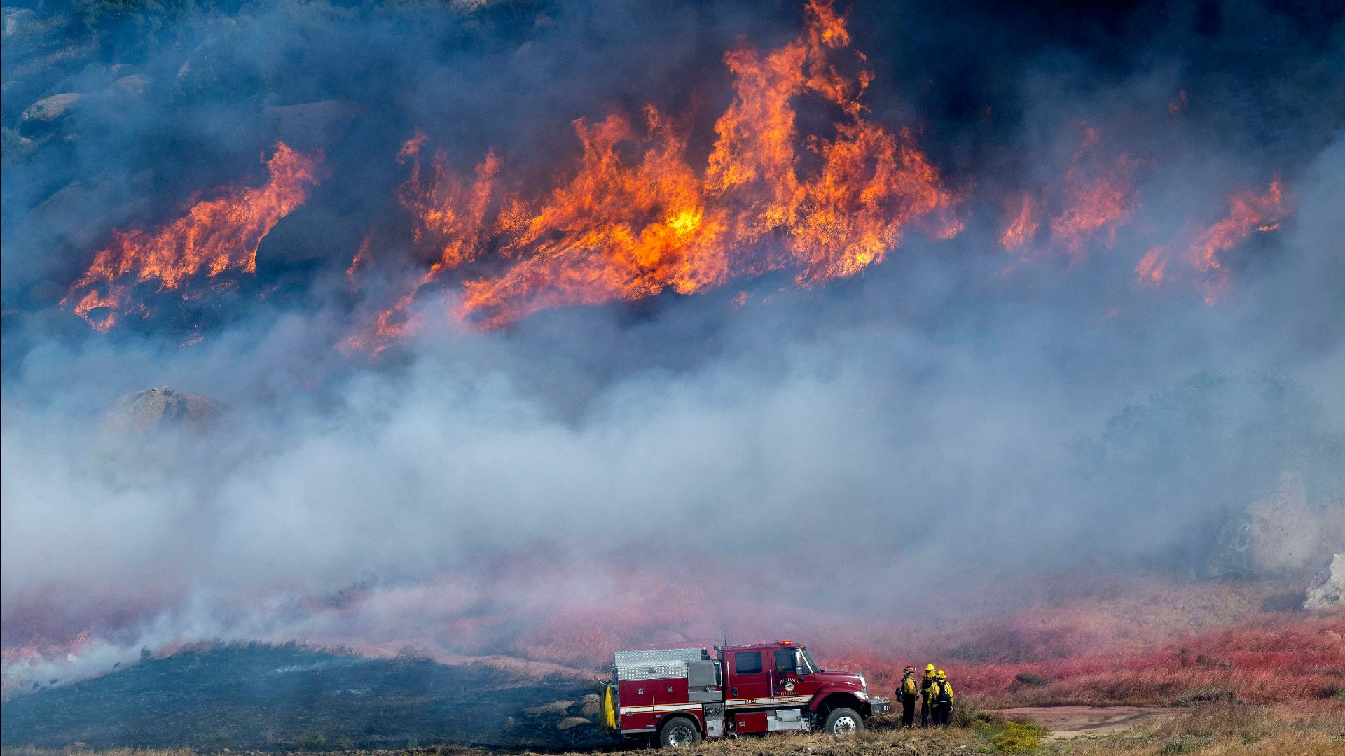 Crews work to contain southern California wildfire as mandatory ...