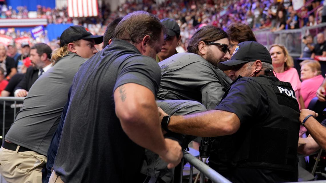 Police use Taser to subdue man who stormed Trump rally media area ...
