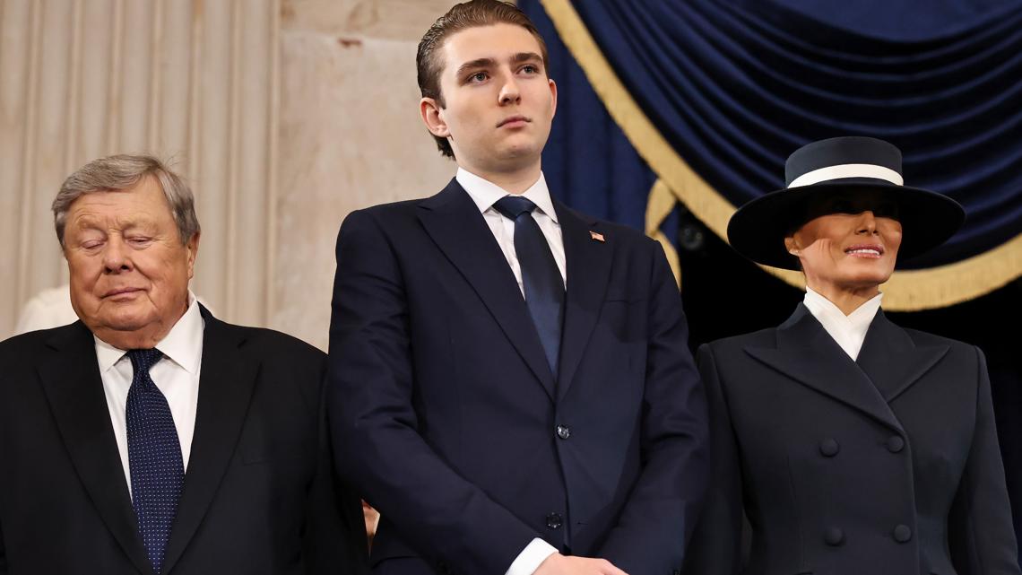 Who is the man sitting next to Barron Trump at the inauguration ...
