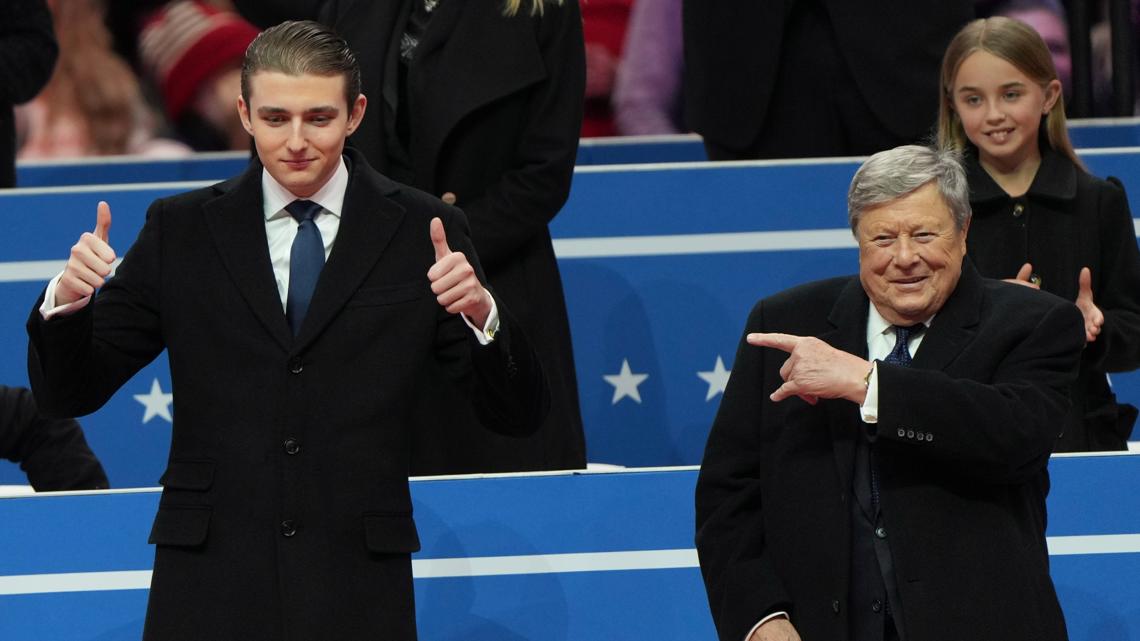 Who is the man sitting next to Barron Trump at the inauguration ...