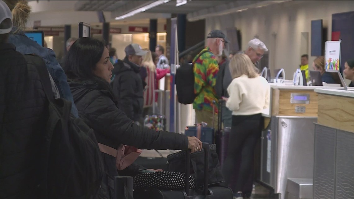 Travelers stranded at XNA during winter weather stay upbeat ...