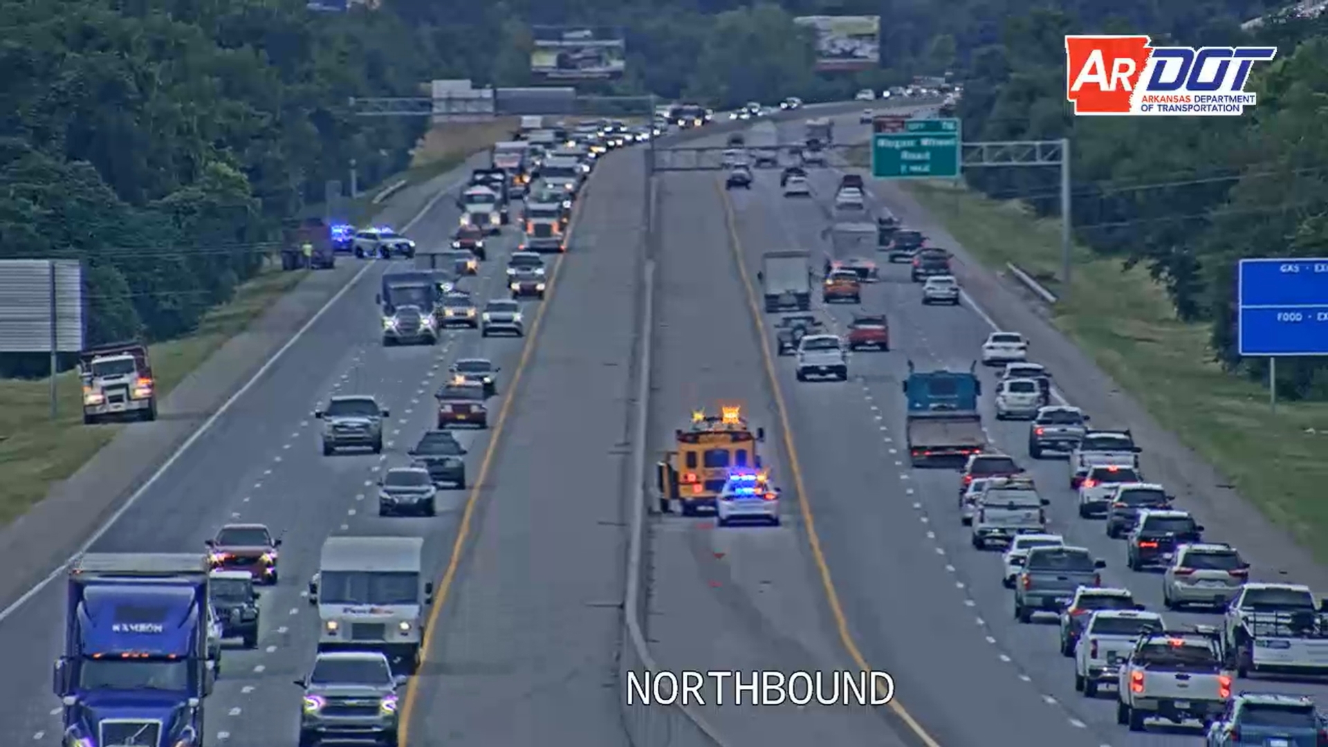 ARDOT cameras show school bus, large trucks stopped on the side of I-49 ...