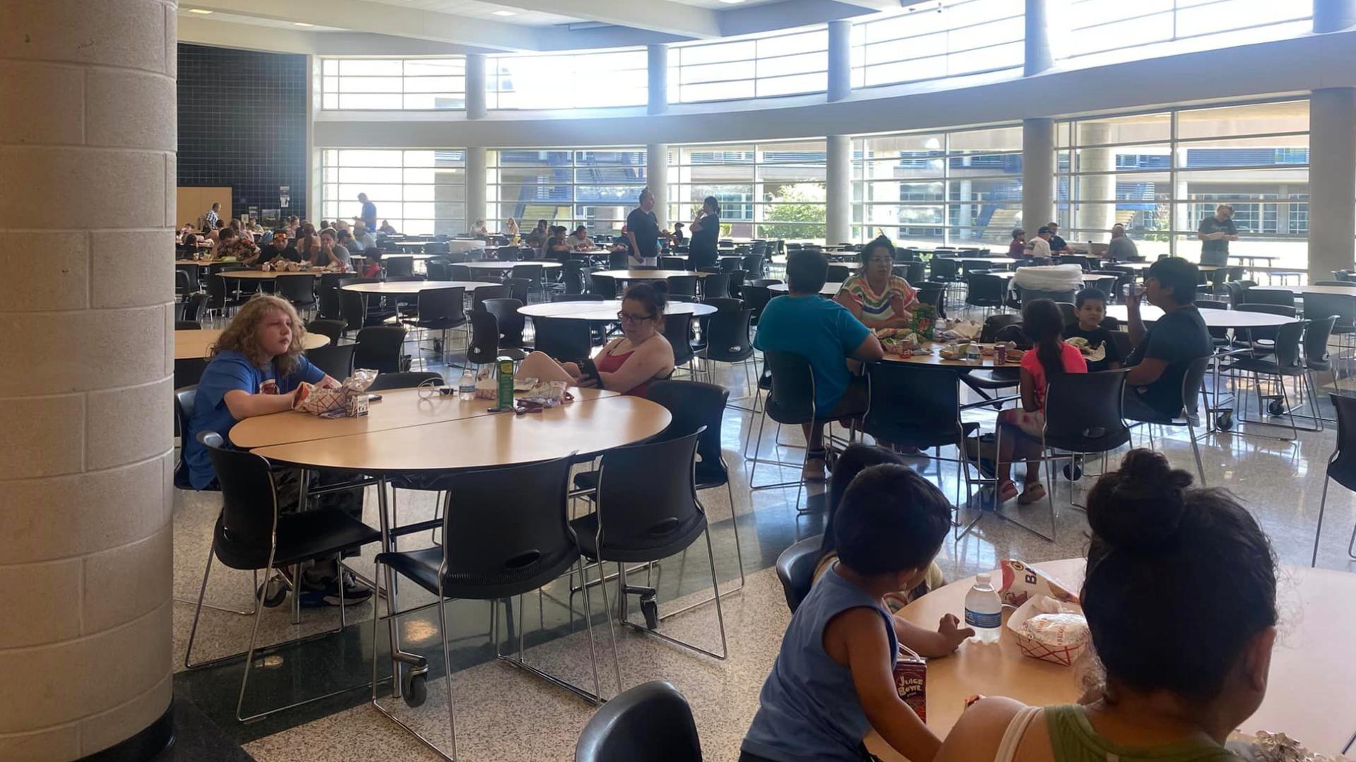 Rogers High School opens as rally point after deadly storms ...