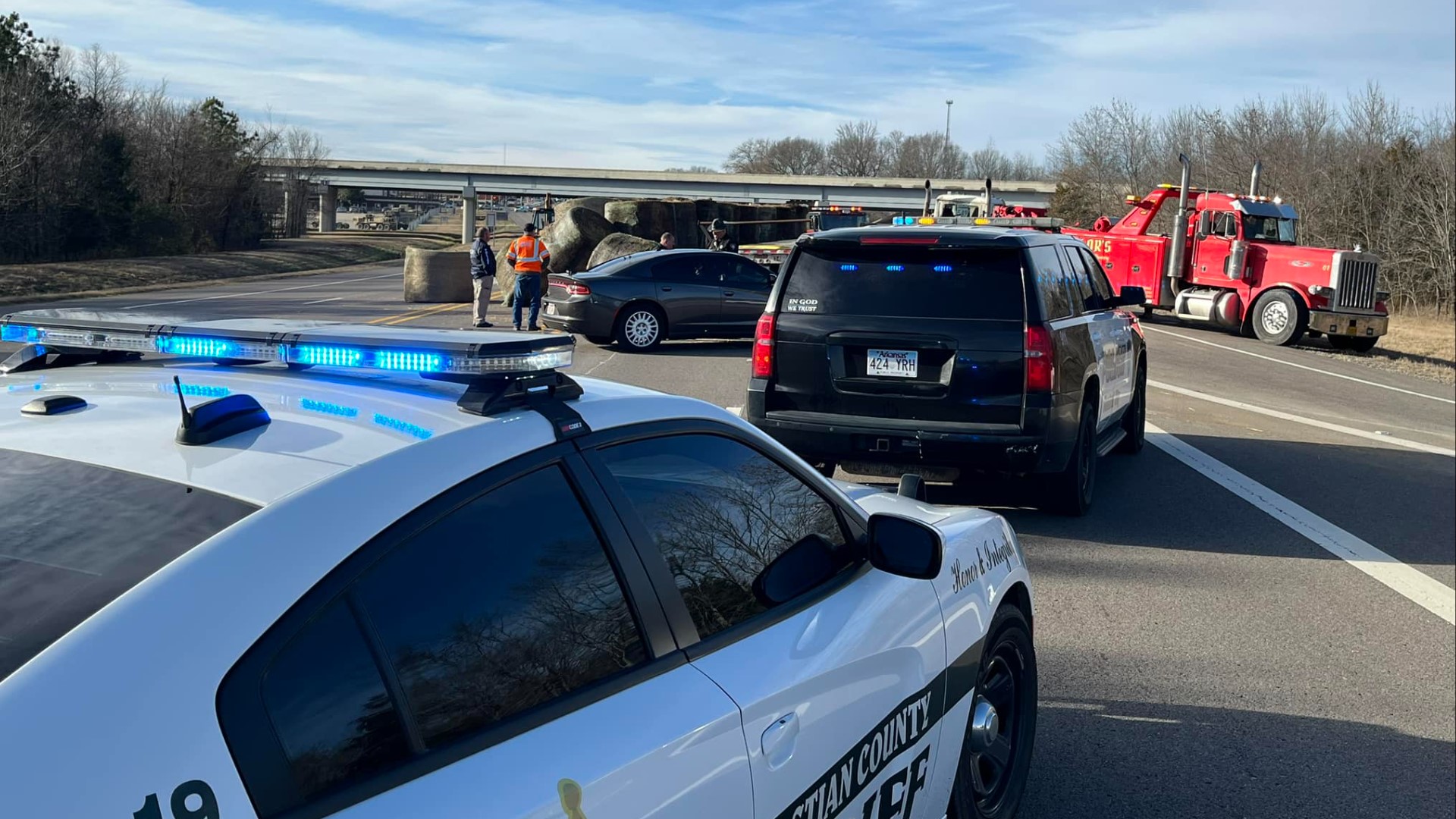 Overturned semi-truck spills hazardous materials on Highway 22 ...