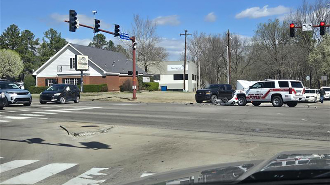 Emergency vehicle damaged in crash at Fort Smith intersection ...