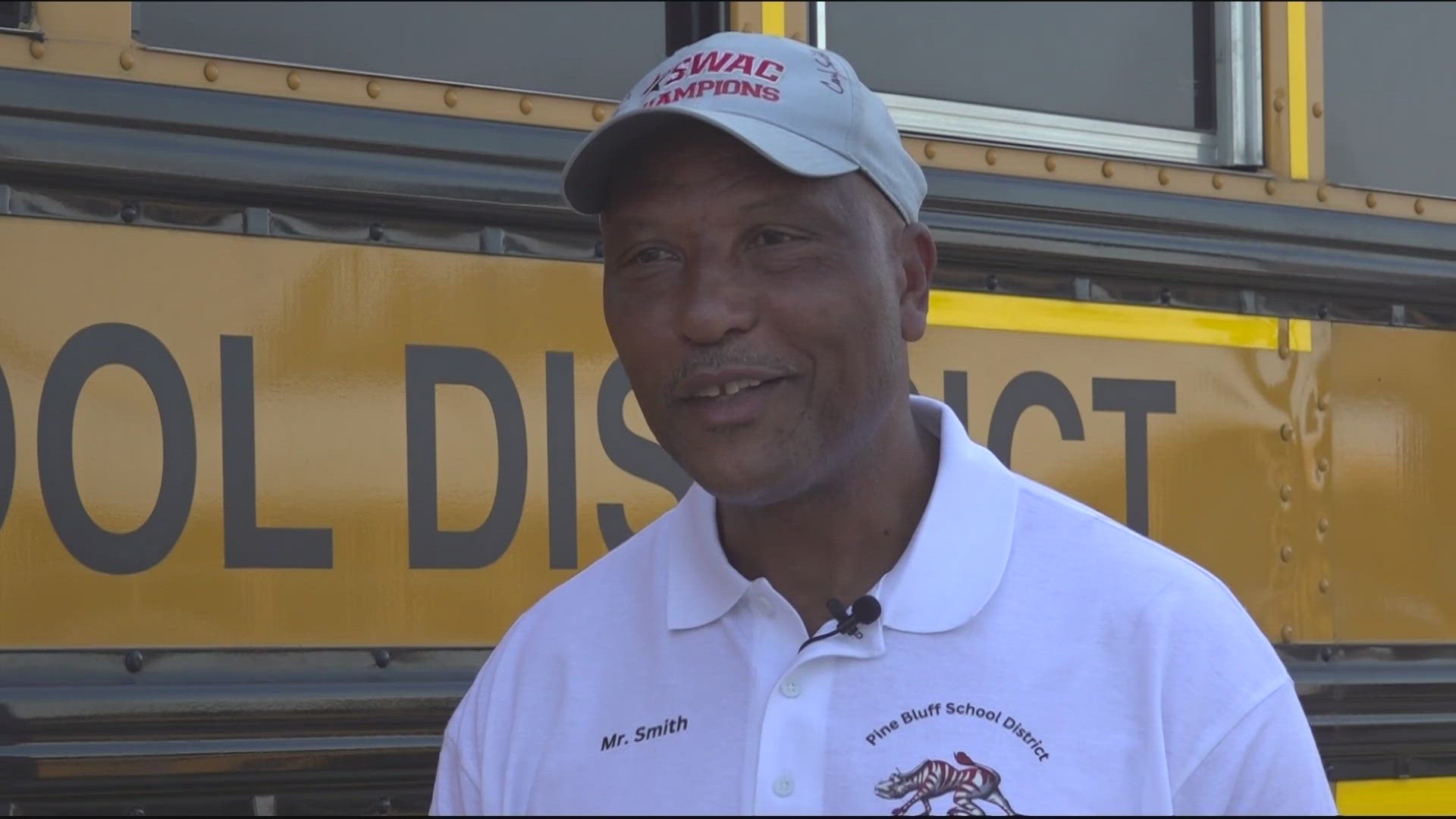 Retired teacher puts out fire after car collides with school bus in ...