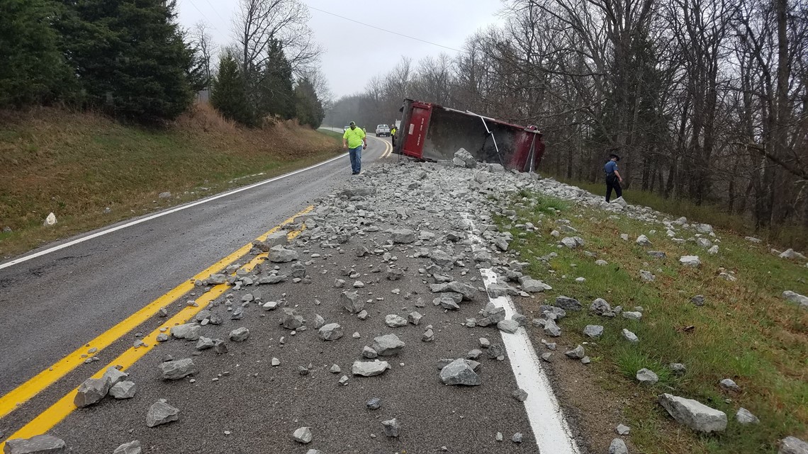 Overturned Dump Truck Spills Gravel And Rock Across Highway 170 Near ...