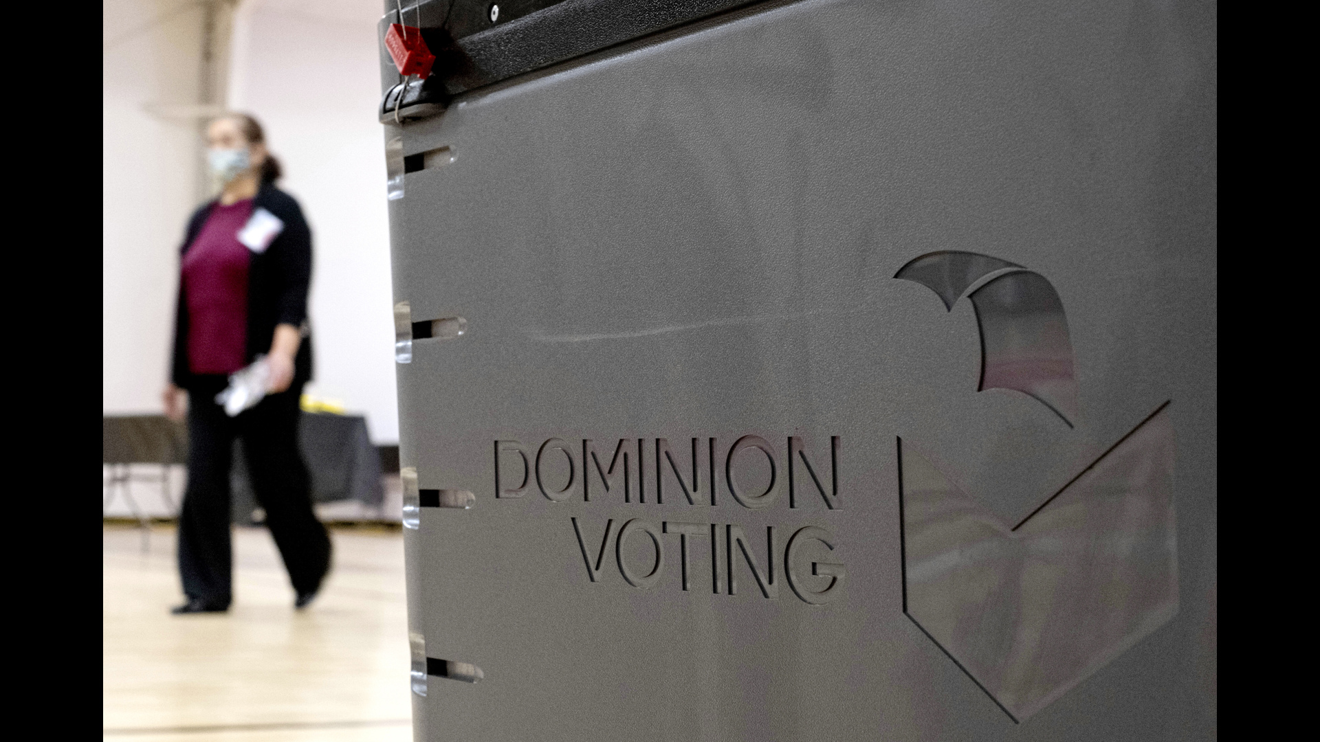Image of Dominion Voting logo flipping ballots is doctored | fox61.com