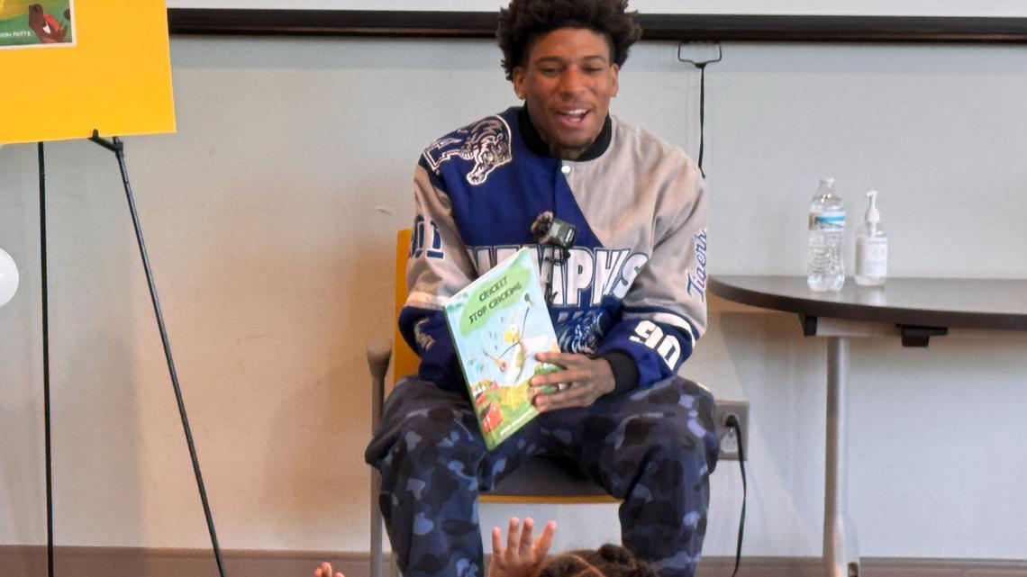 NLE Choppa reads book to children during egg hunt | localmemphis.com