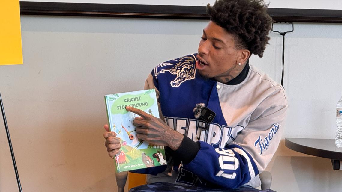 NLE Choppa reads book to children during egg hunt | localmemphis.com