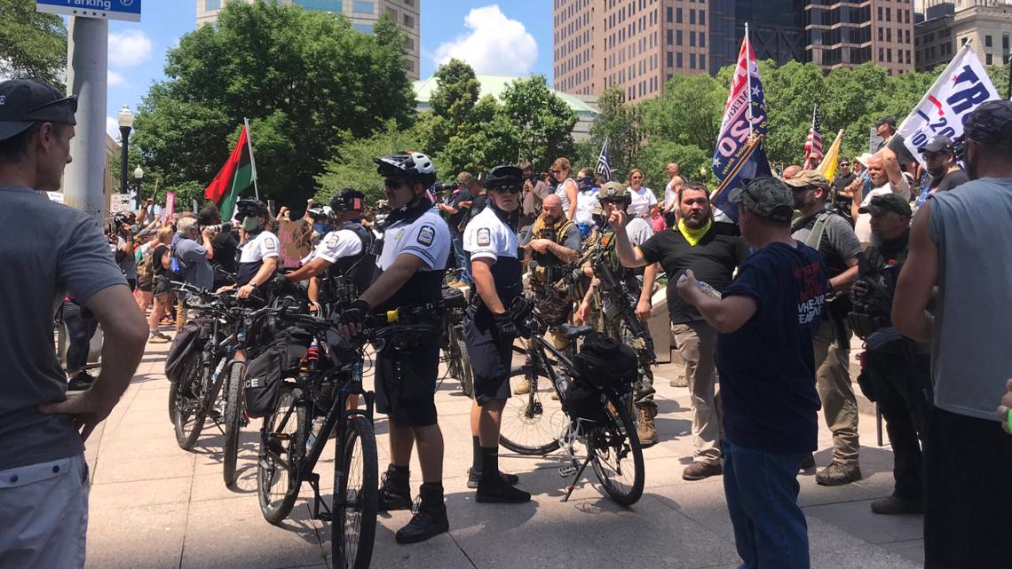 Multiple protest groups separated by law enforcement at Statehouse ...