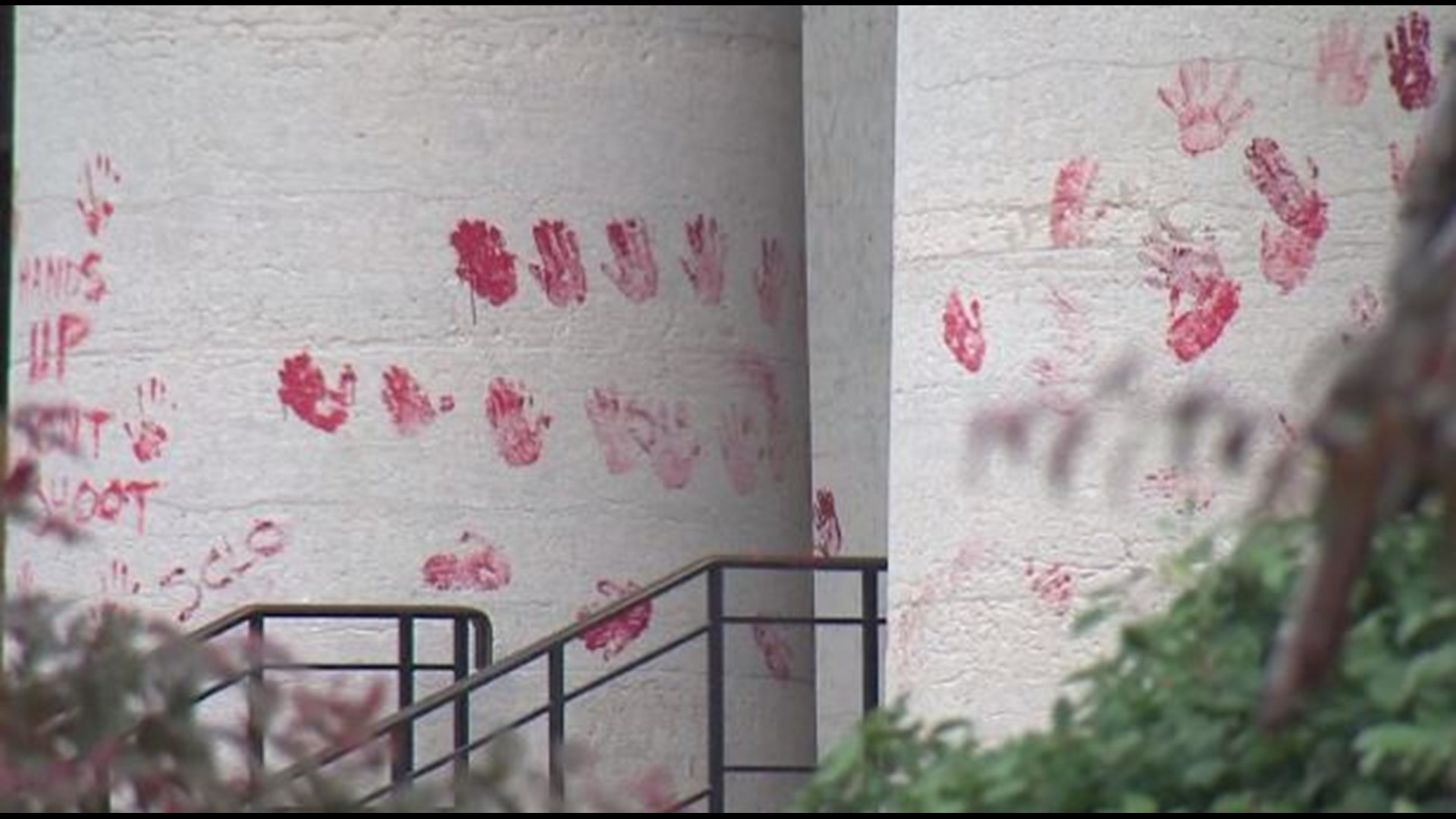 Protesters paint red handprints at Statehouse, DeWine expresses 'anger ...