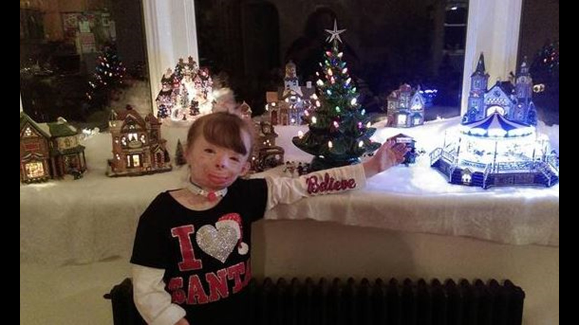 Girl who lost family in fire spreads holiday cheer after Christmas wish ...