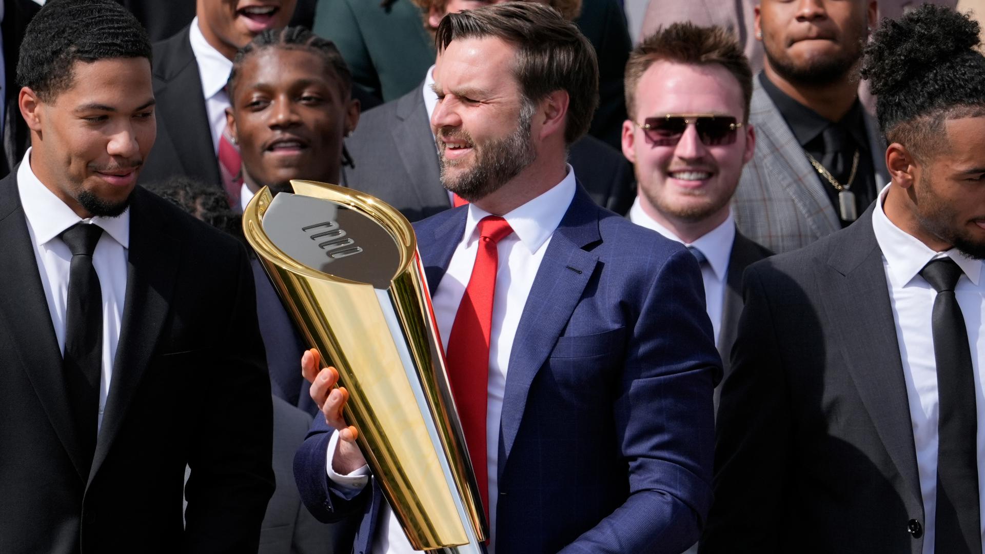 JD Vance almost drops Ohio State national championship trophy | 10tv.com