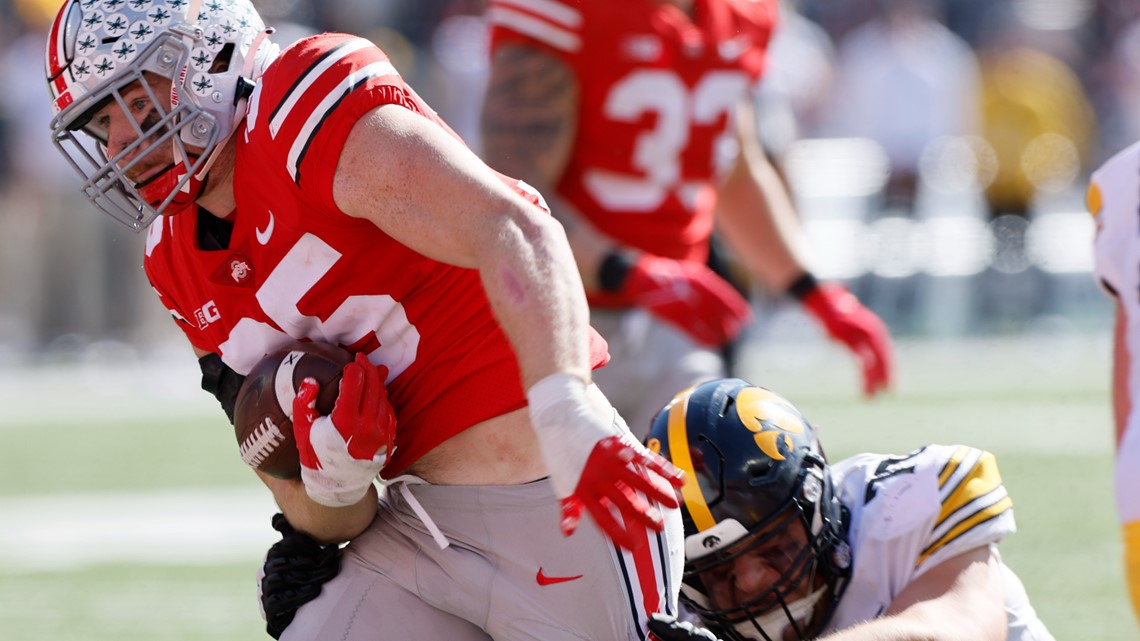 Buckeyes catch fire late, pound bumbling Iowa 54-10 | 10tv.com