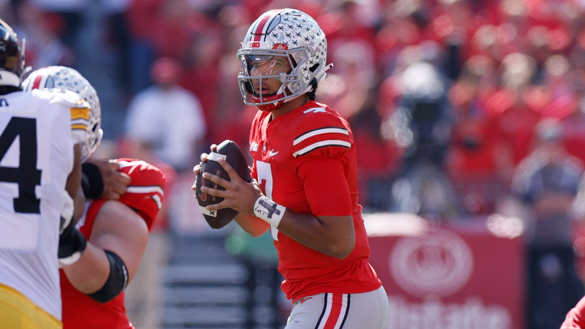 No. 2 Buckeyes catch fire late, defeat bumbling Iowa 54-10 | wqad.com