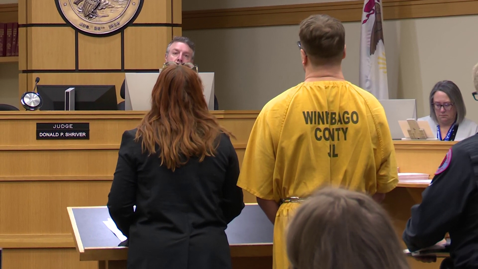 2 people, including firefighter, hospitalized after car travels into ...