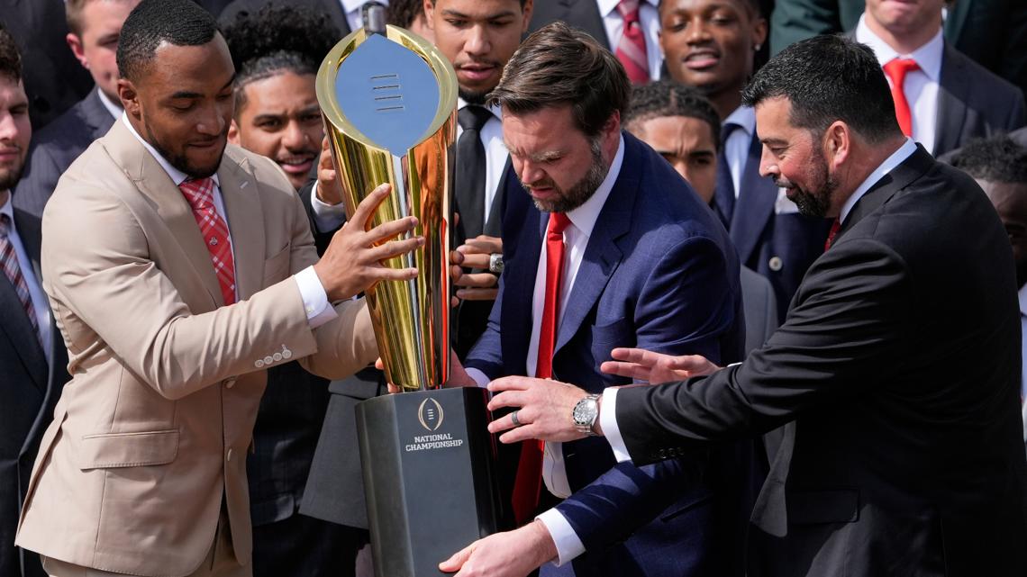 JD Vance almost drops Ohio State national championship trophy | 10tv.com