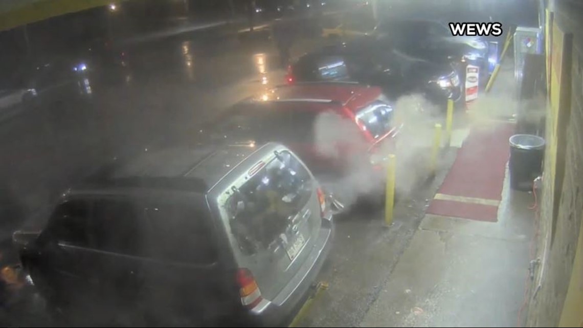 Police release video of family with children escaping shootout in ...