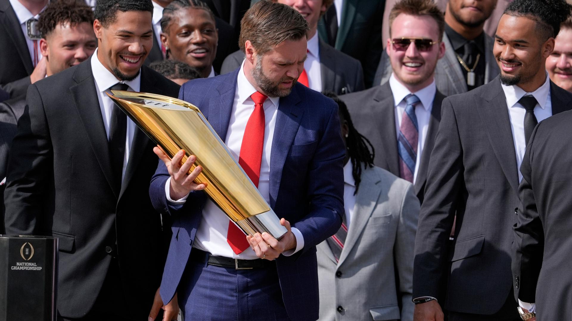 JD Vance almost drops Ohio State national championship trophy | 10tv.com
