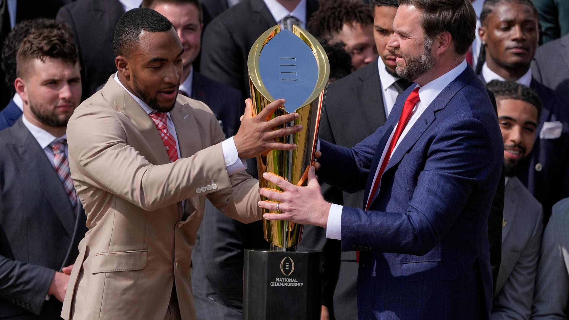 JD Vance almost drops Ohio State national championship trophy | 10tv.com