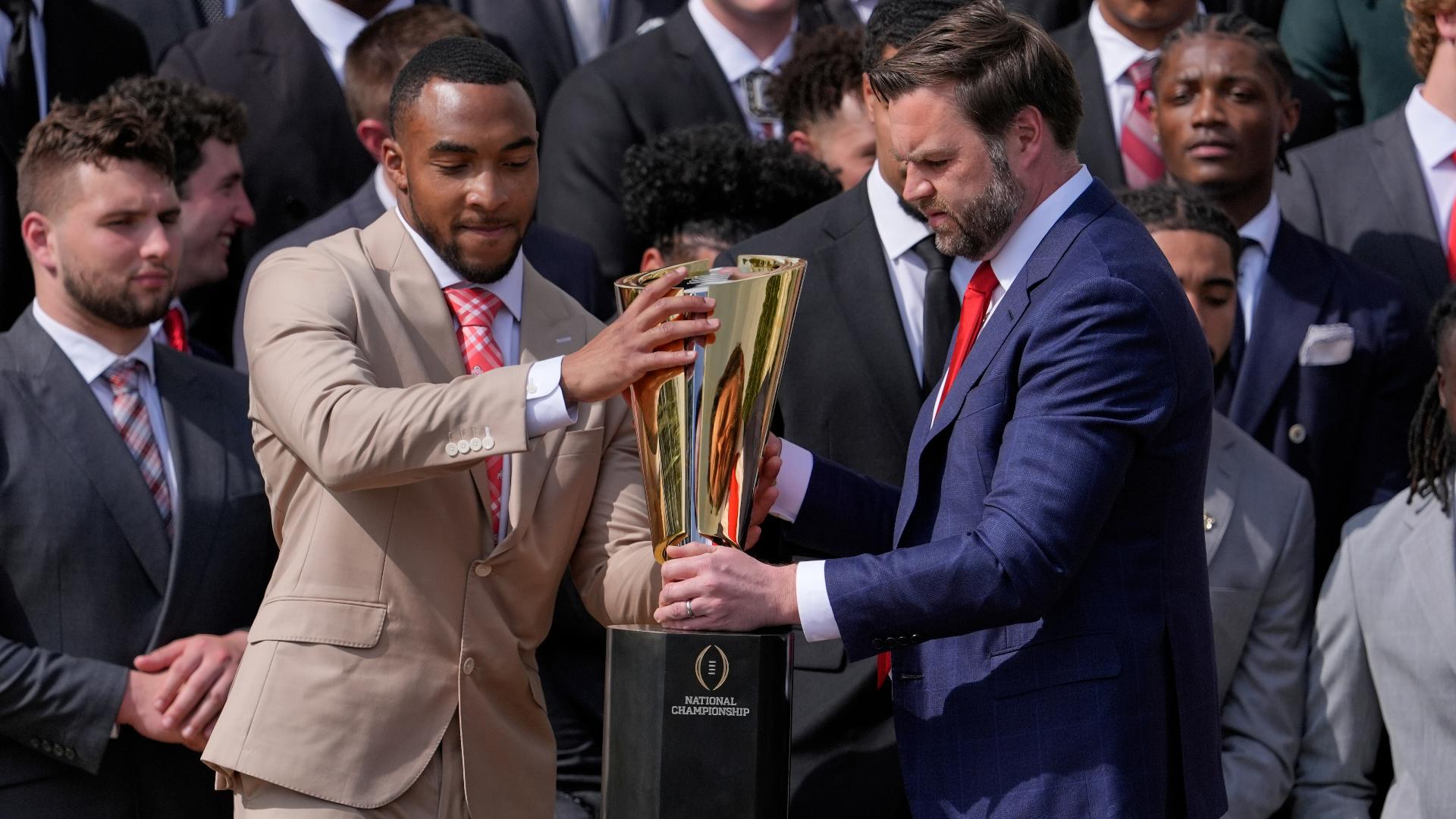 JD Vance almost drops Ohio State national championship trophy | 10tv.com