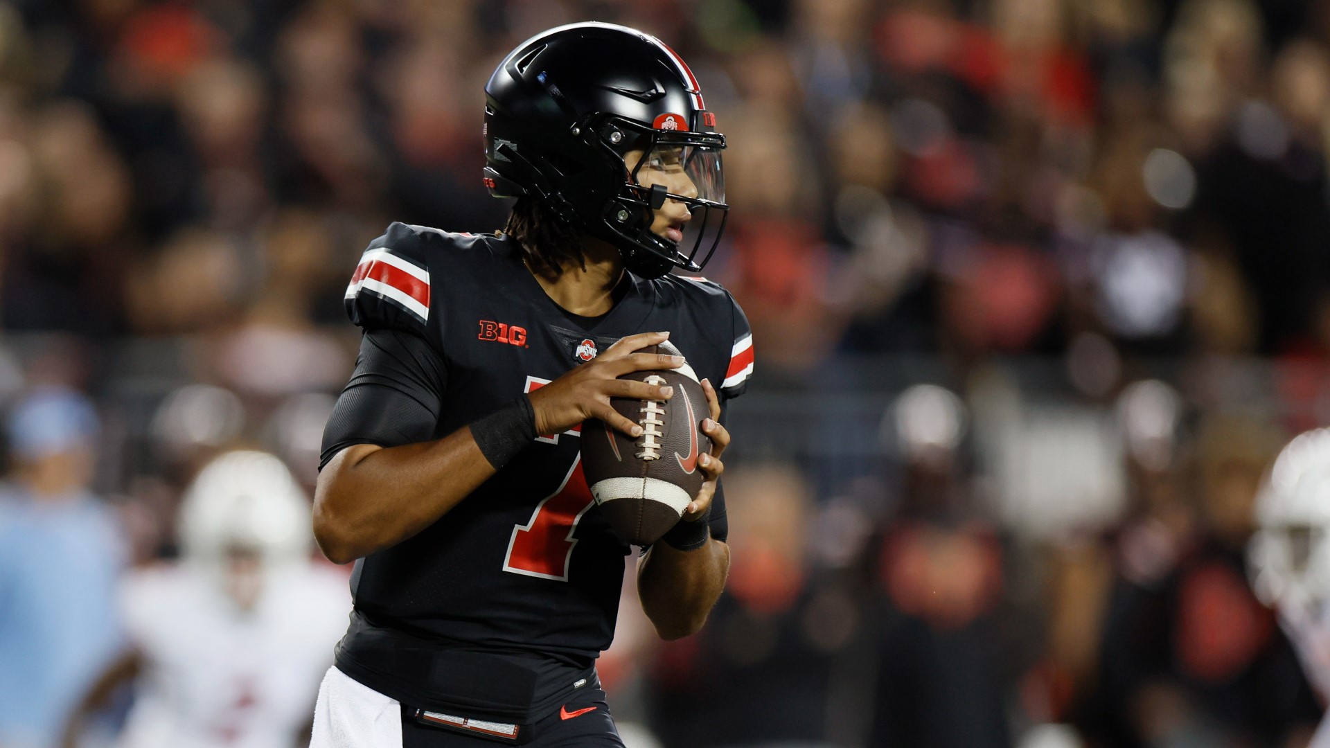 Buckeyes score early and often, bury Wisconsin 52-21 | 10tv.com
