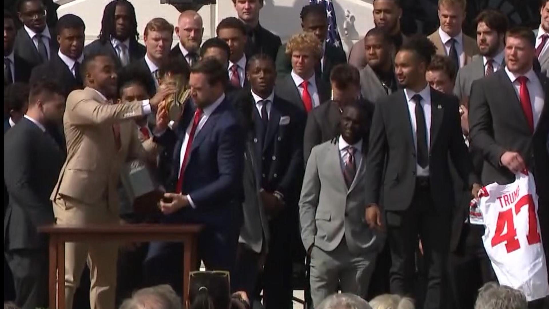 JD Vance nearly drops Ohio State national championship trophy | 10tv.com