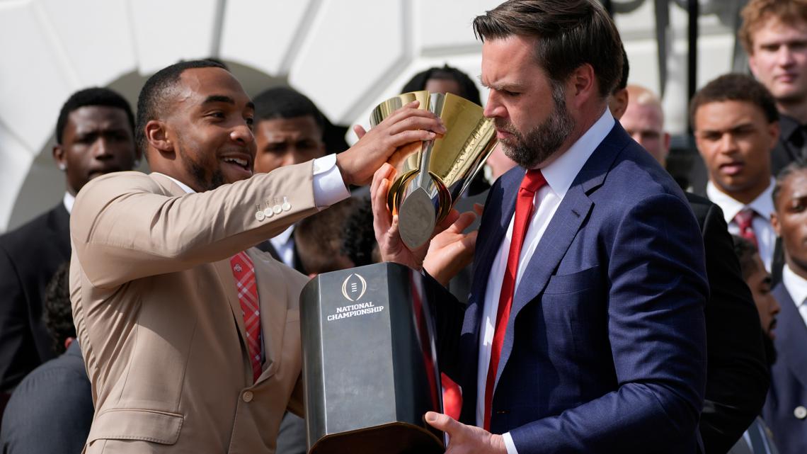 JD Vance almost drops Ohio State national championship trophy | 10tv.com