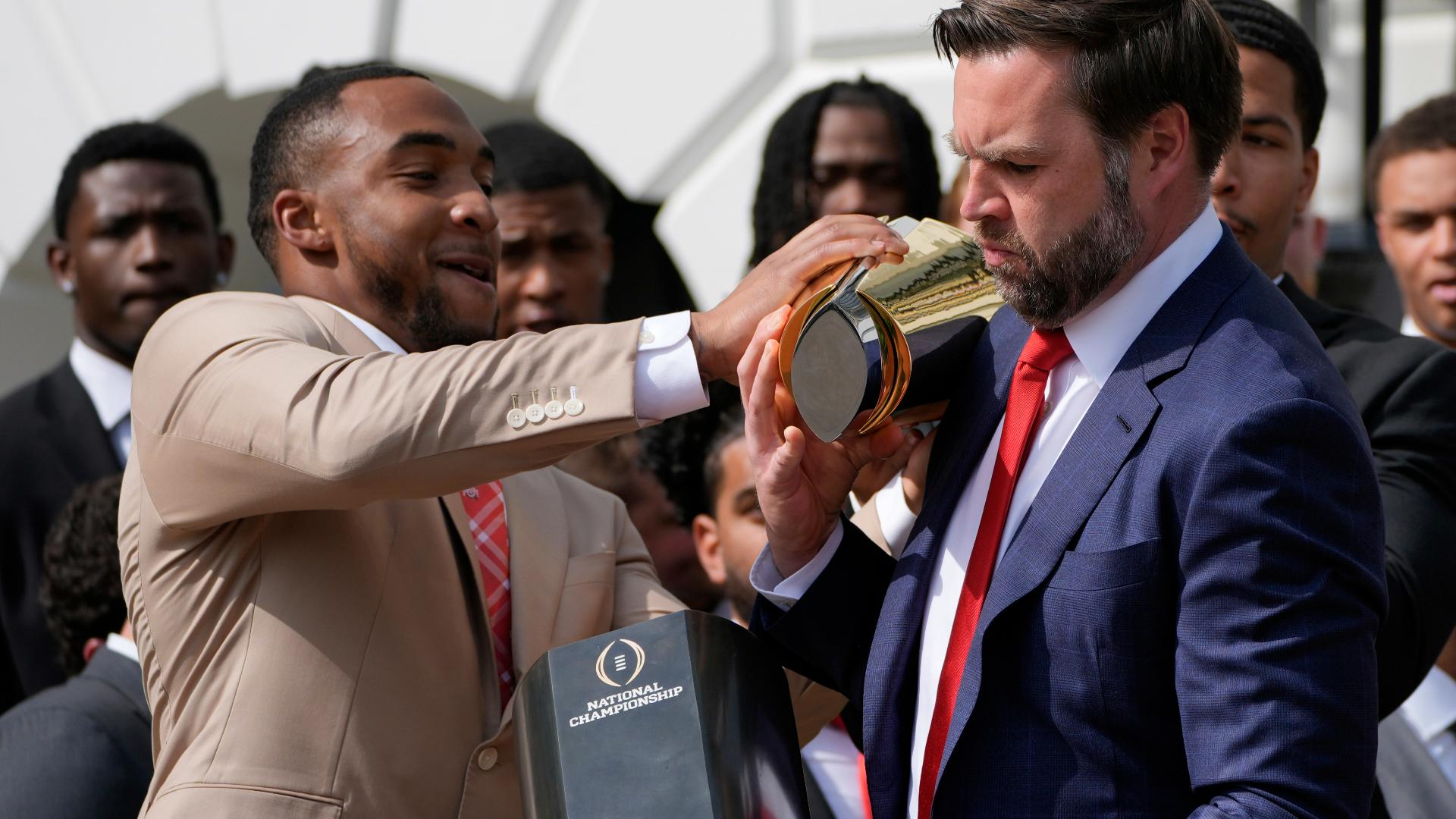 JD Vance almost drops Ohio State national championship trophy | 10tv.com