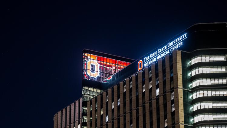 Wexner Medical Center lights Block O on University Hospital | 10tv.com