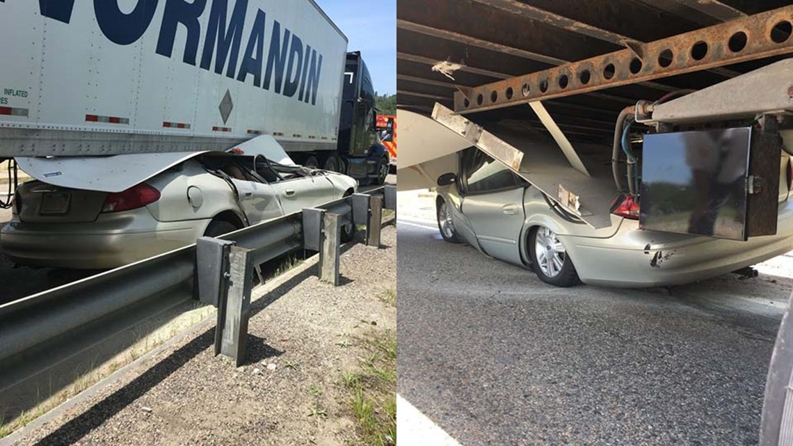 Driver suffers minor injuries when car slides under truck | 10tv.com