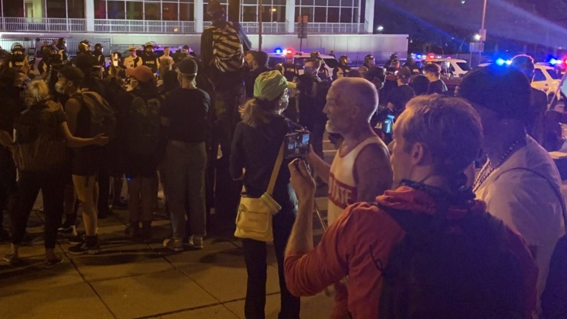 Crowd of protesters gather near City Hall in downtown Columbus | 10tv.com