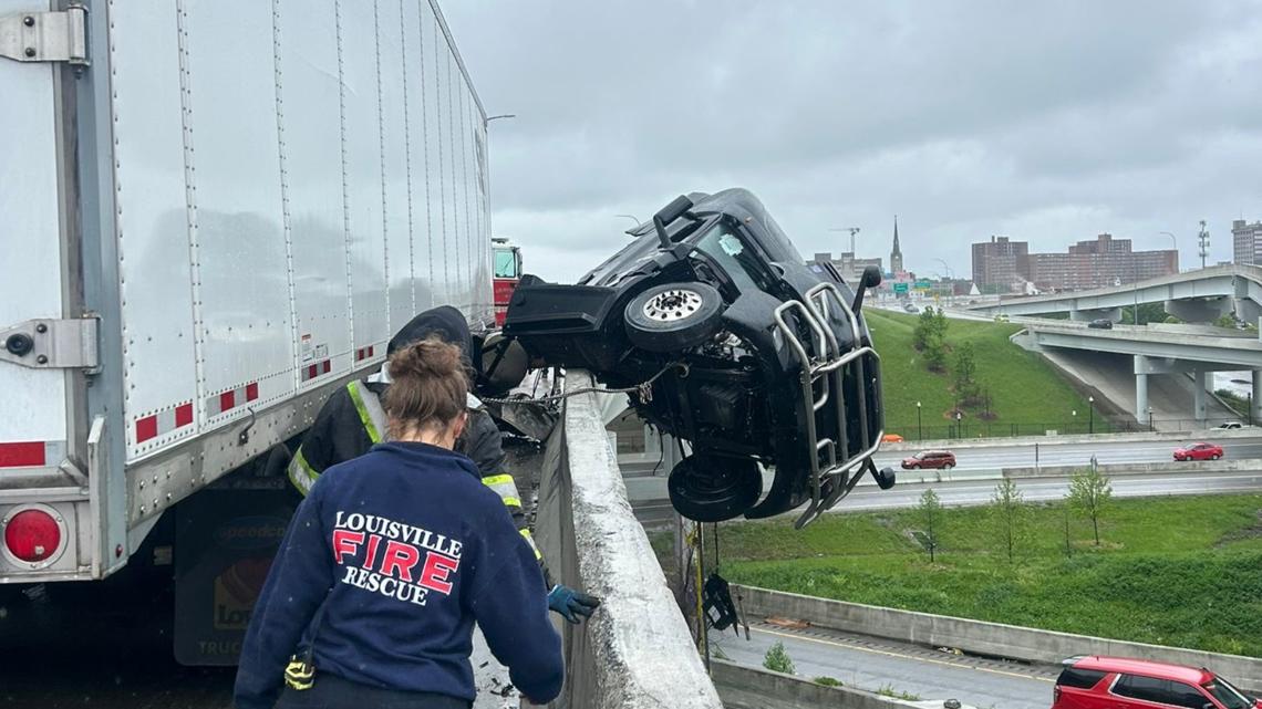 911 call with driver of semi hanging off Kennedy bridge released | wthr.com
