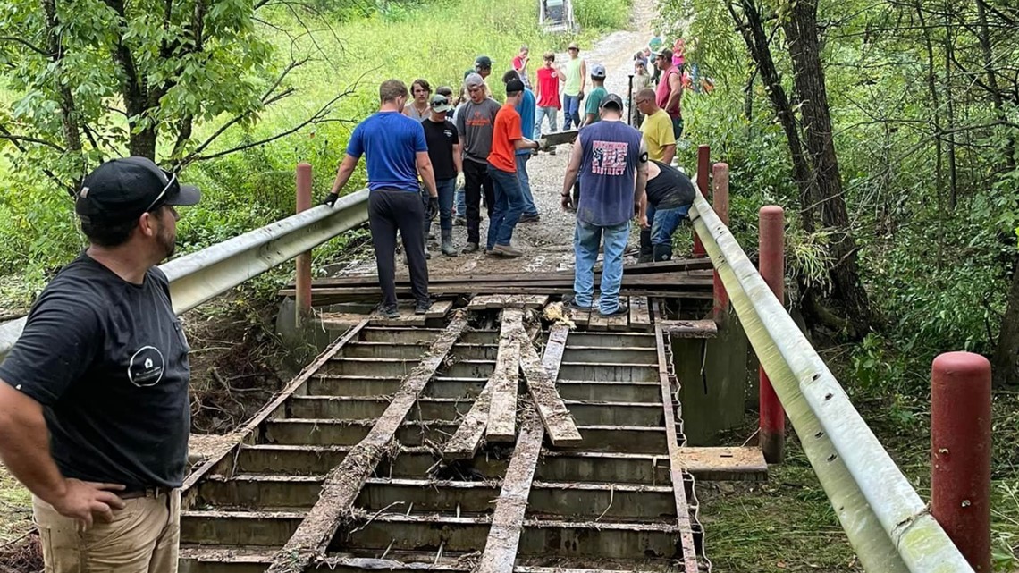 Indiana football team rebuilds broken bridge after flooding | wthr.com