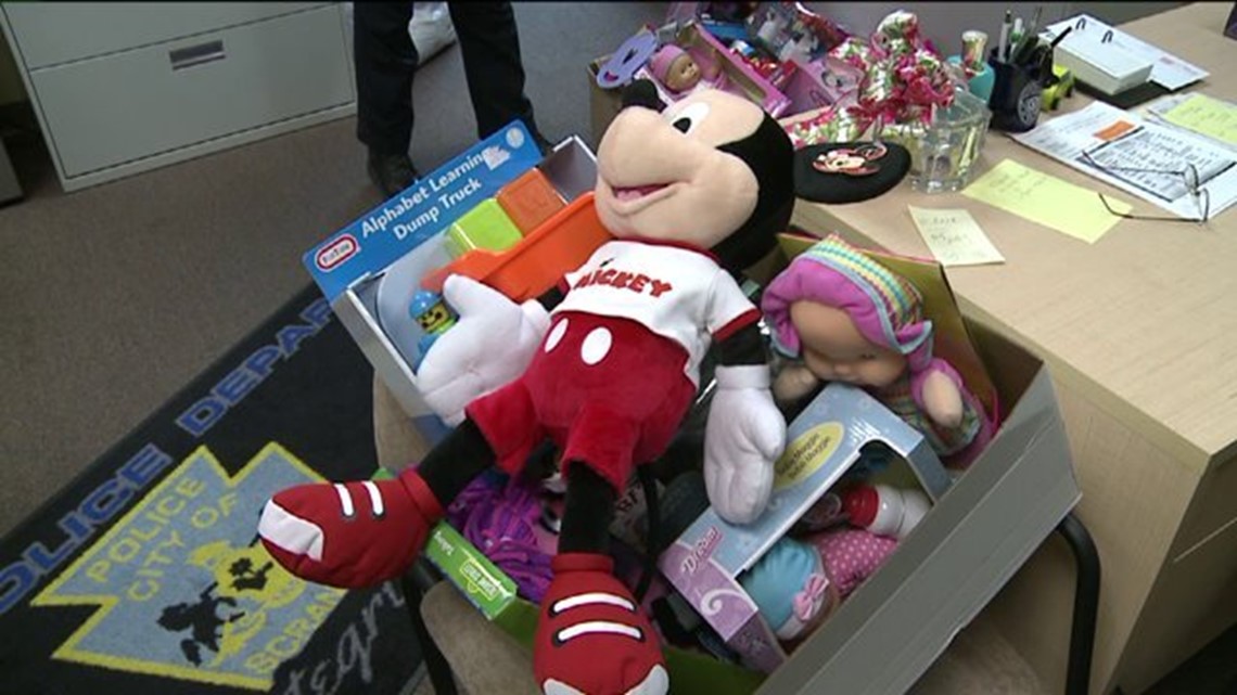 Police Collect Toys and Clothes for Kids | wnep.com