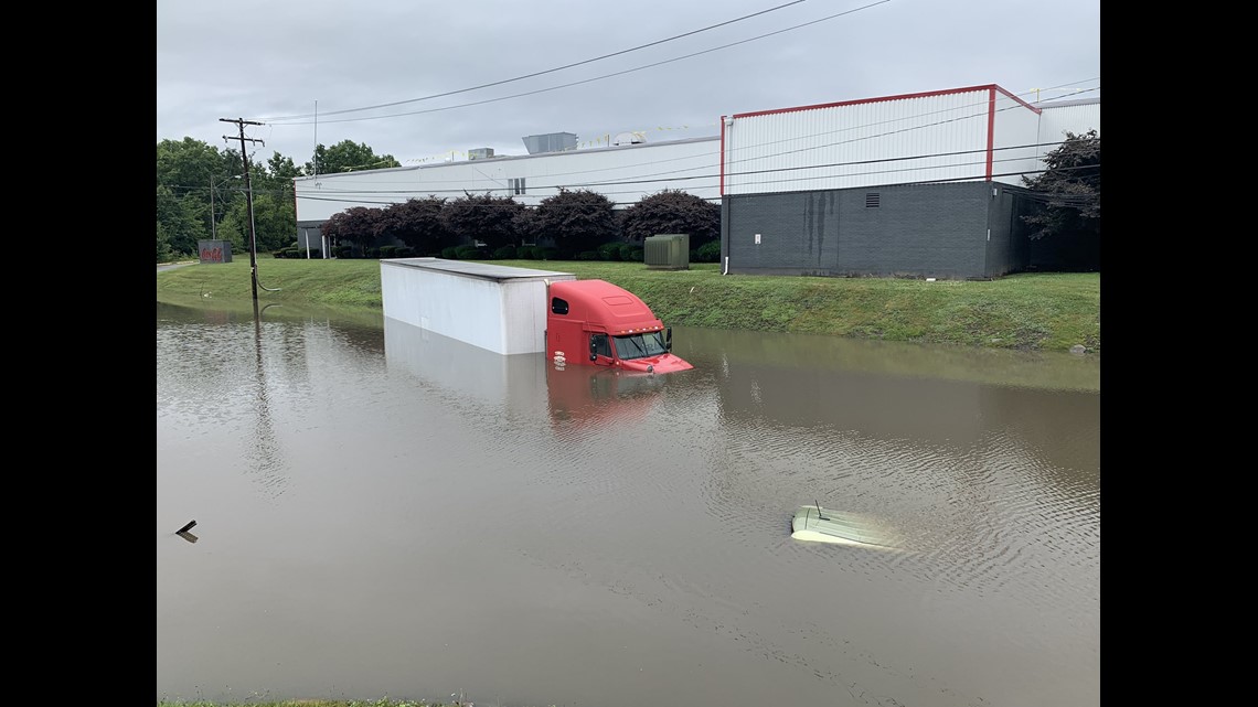 Tractor-trailer, Car Submerged in Flooded Road | wnep.com