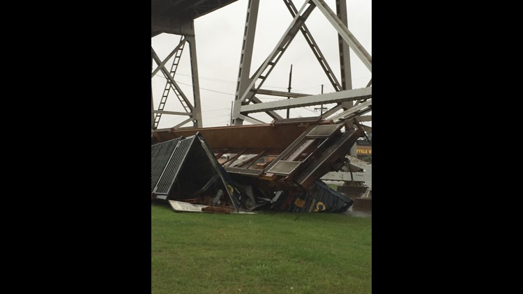 Incredible Video: Train Blown Off Elevated Bridge During Storm in New ...