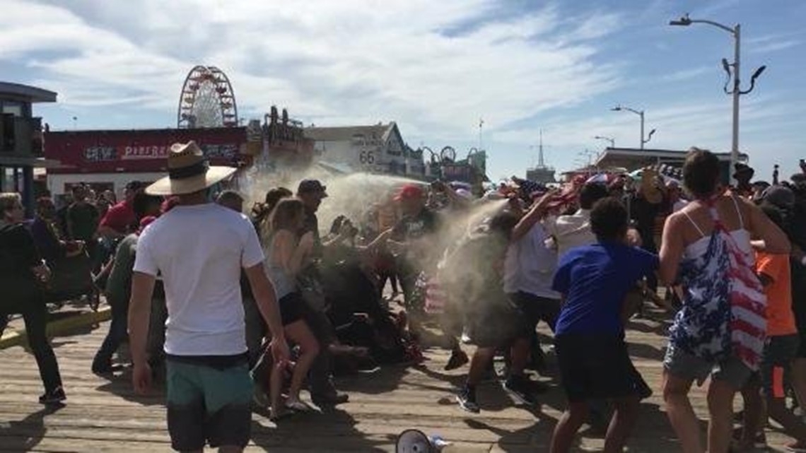 Man in MAGA hat sprays Trump protesters with bear repellent | wnep.com