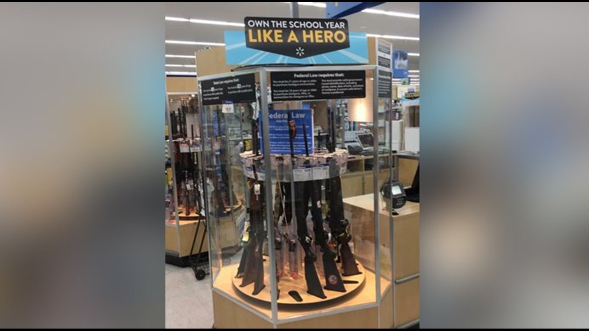 Photo of ‘own the school year like a hero’ gun display at Walmart ...