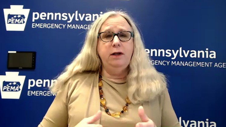 Dunk tank photos showing man dressed as PA Health Secretary Dr. Rachel ...