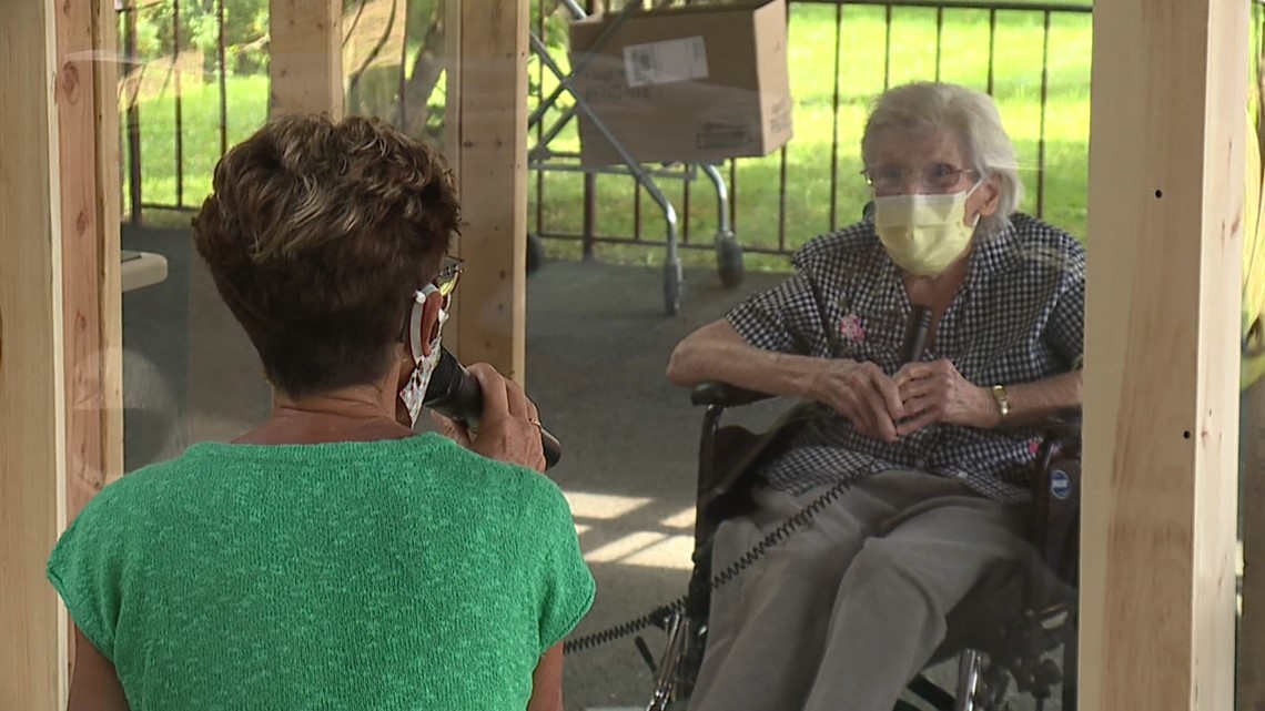 Nursing home residents welcoming visitors with safety booths | wnep.com