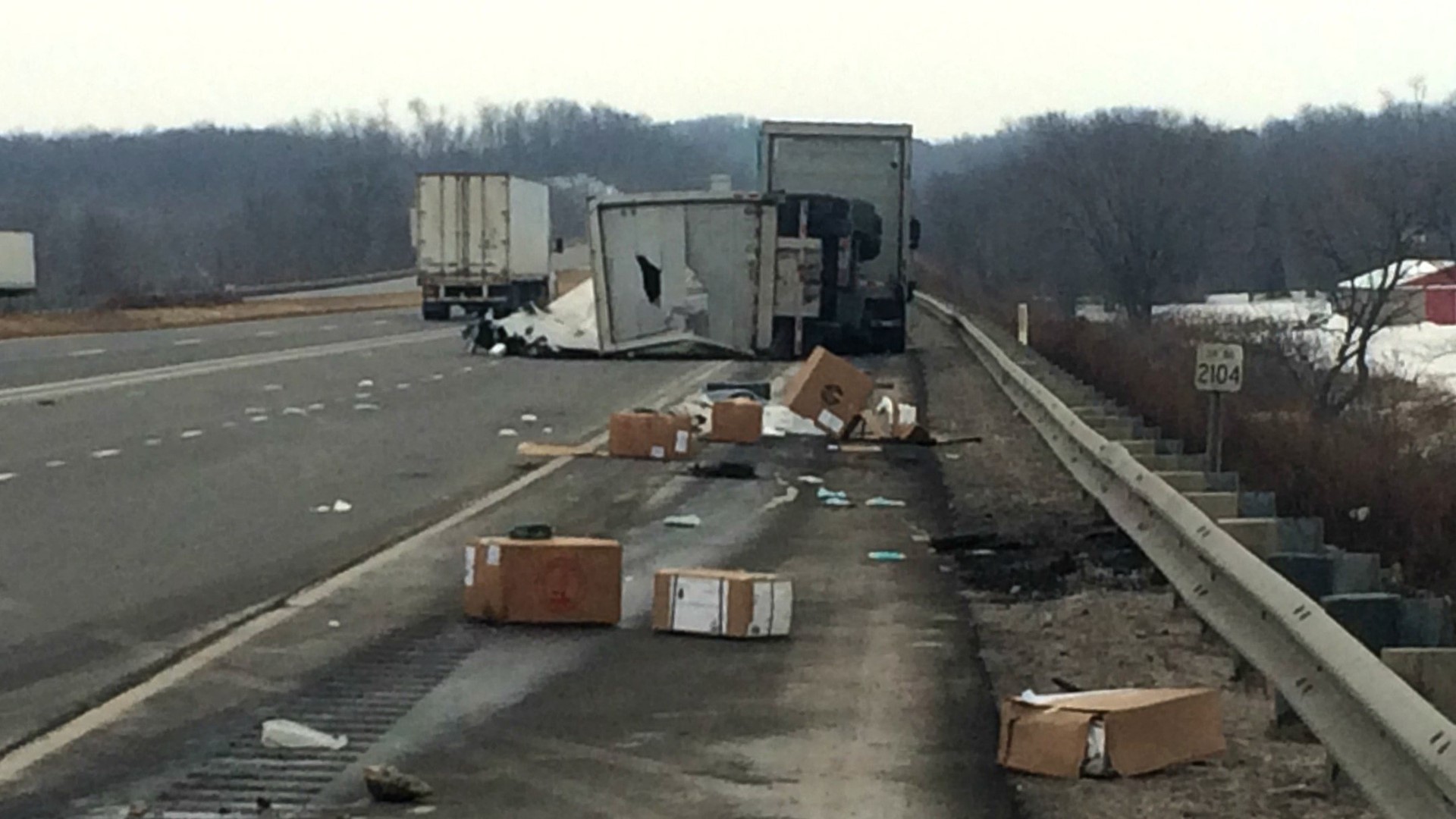 UPS Truck Crash Spills Packages Along Highway | wnep.com
